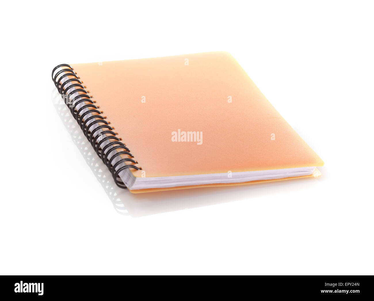 orange spiral book isolated on a white background Stock Photo - Alamy