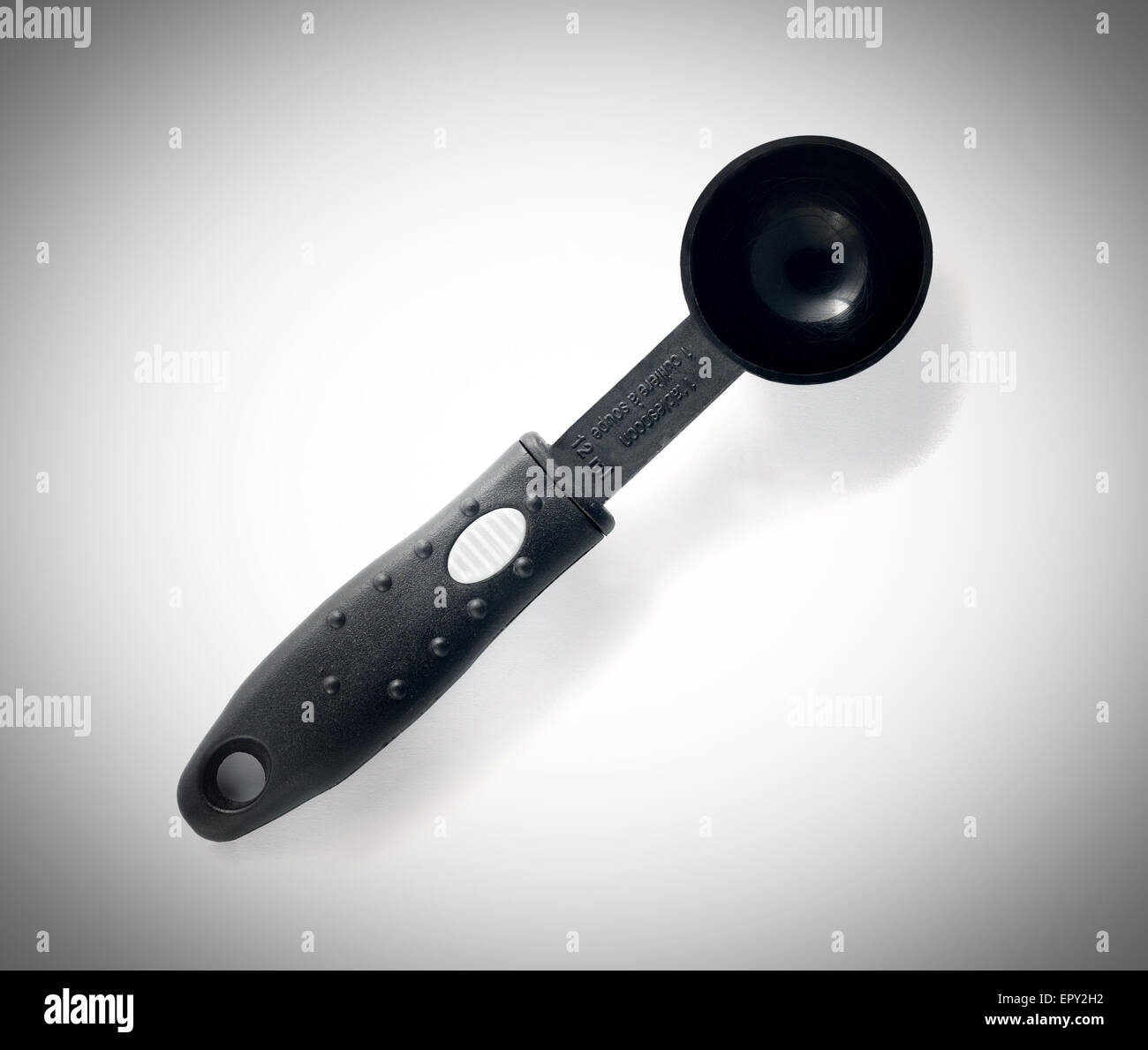 measuring teaspoon isolated on a white background Stock Photo - Alamy