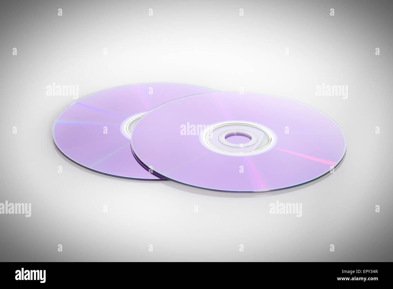 two dvd isolated on a white background Stock Photo - Alamy