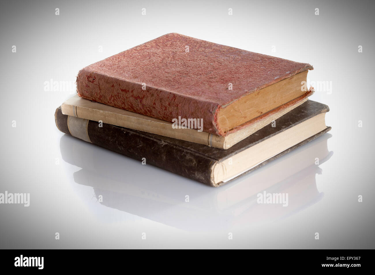 stack of old books isolated on a white background Stock Photo - Alamy