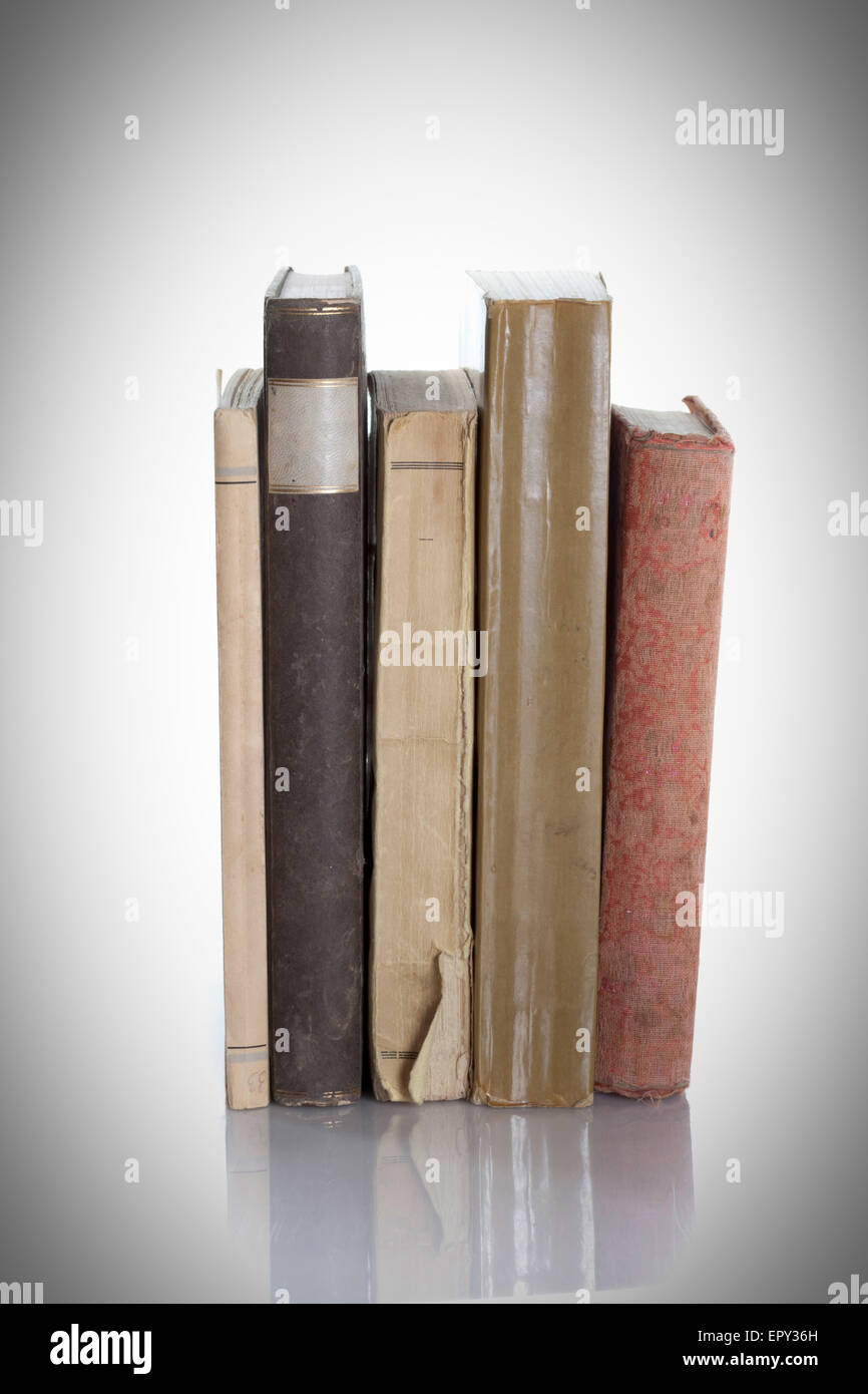 stack of old books isolated on a white background Stock Photo - Alamy