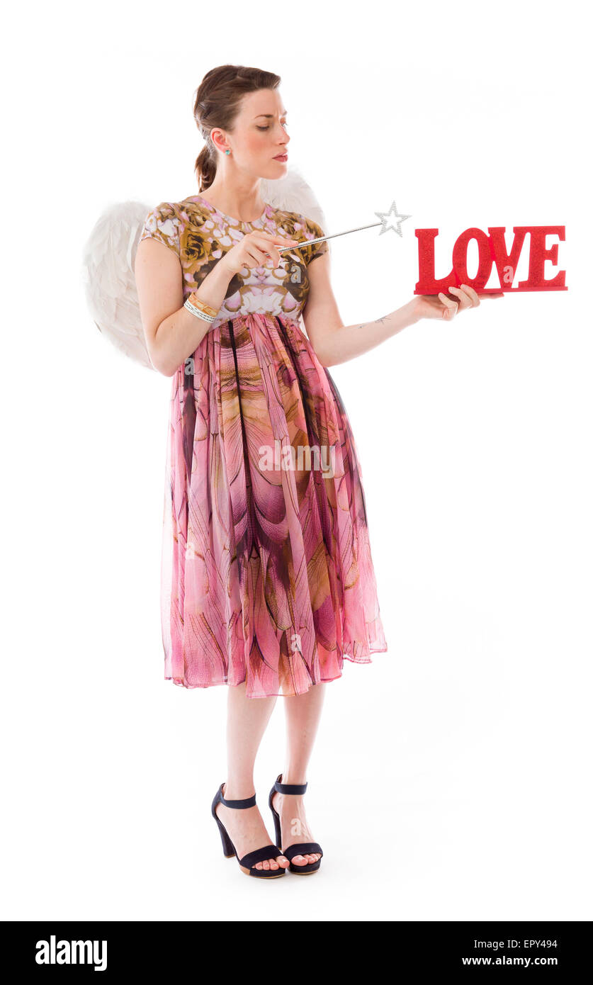 Model in studio isolated on plain grey background Stock Photo - Alamy