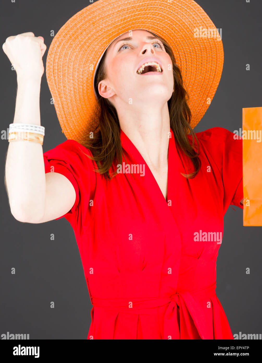 Model in studio isolated on plain grey background Stock Photo - Alamy