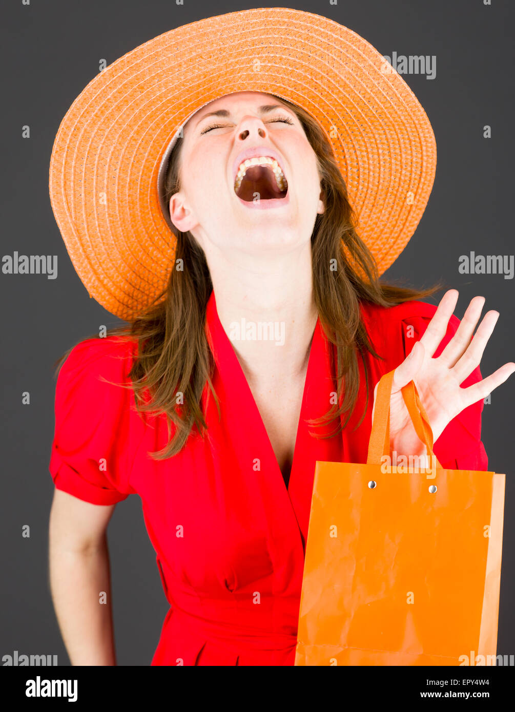 Model in studio isolated on plain grey background Stock Photo - Alamy