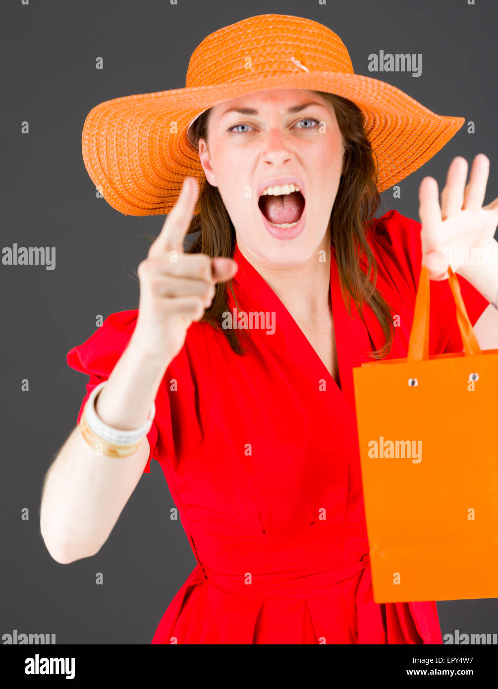 Model in studio isolated on plain grey background Stock Photo - Alamy