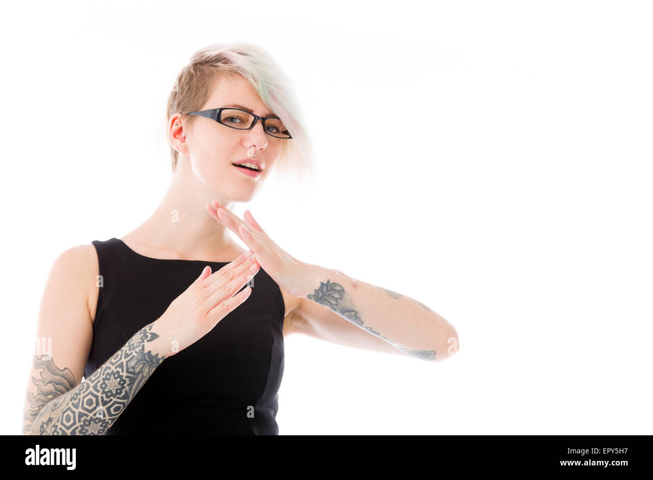 model isolated on plain background hand gesture break sign Stock Photo ...