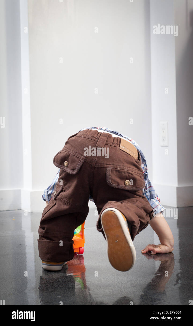 Boy bending over rear hi-res stock photography and images - Alamy