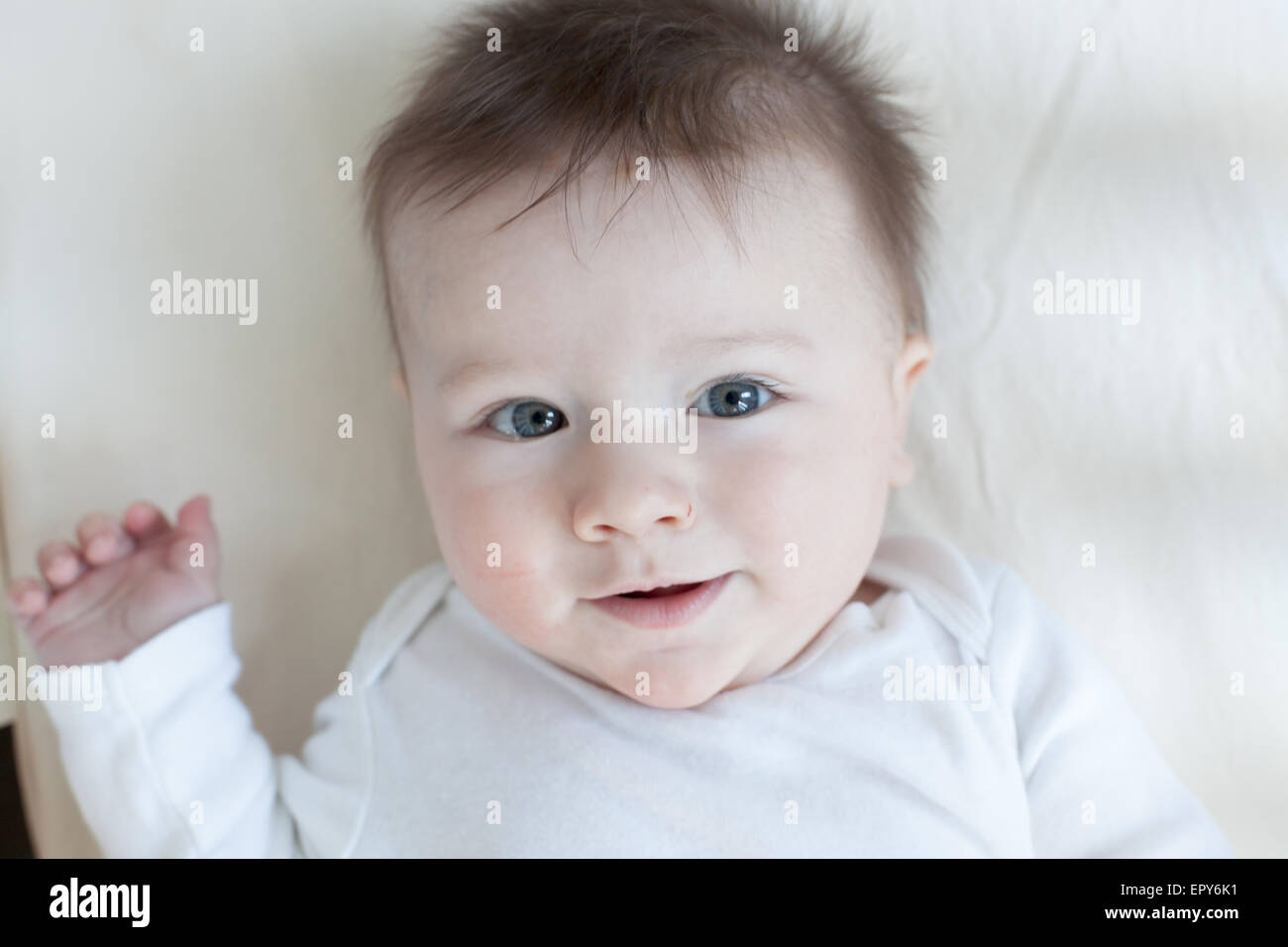 Close-up of a baby boy playing Stock Photo - Alamy
