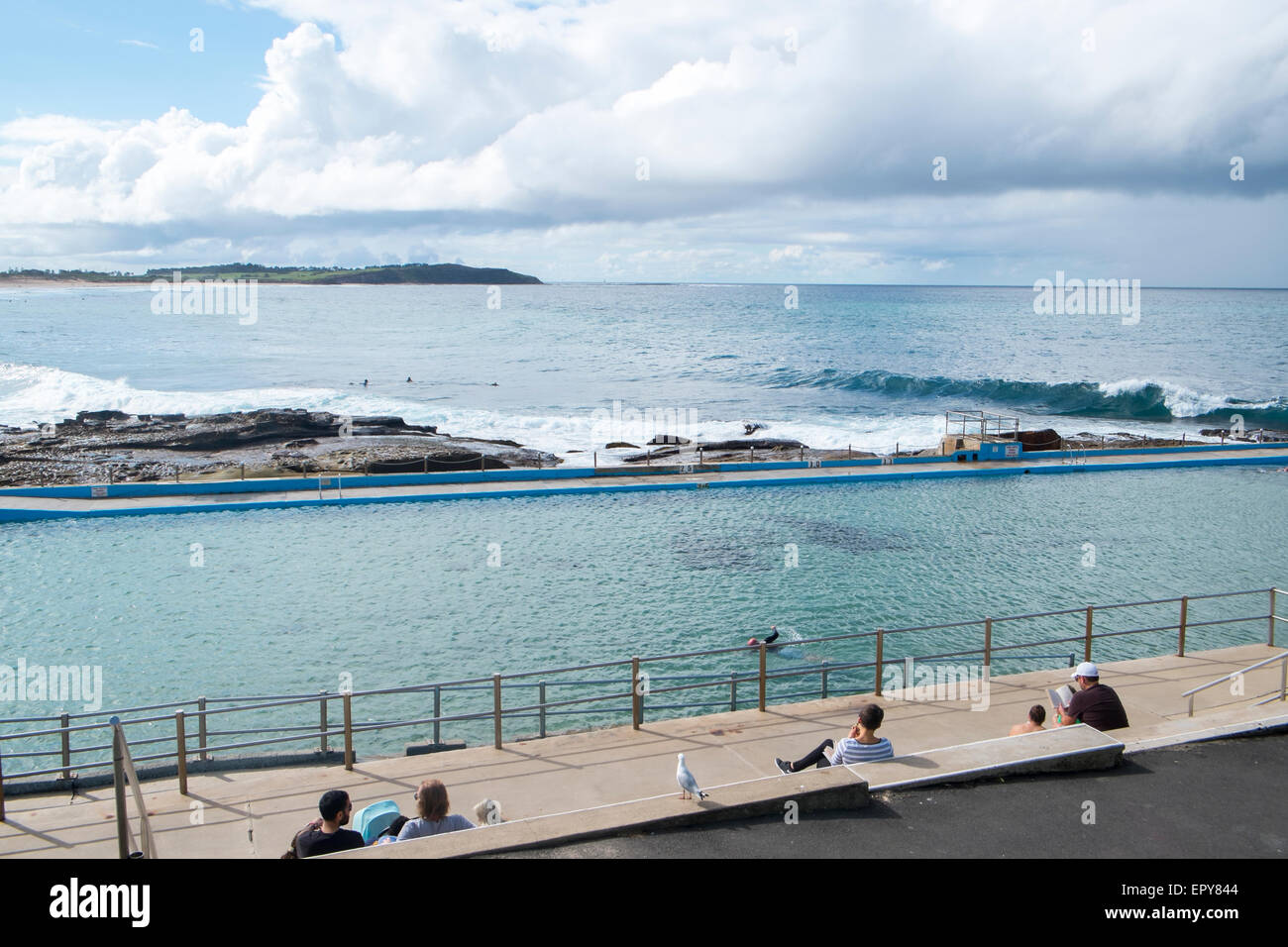 Dee Why beach rockpool swimming pool with people relaxing and enjoying ...