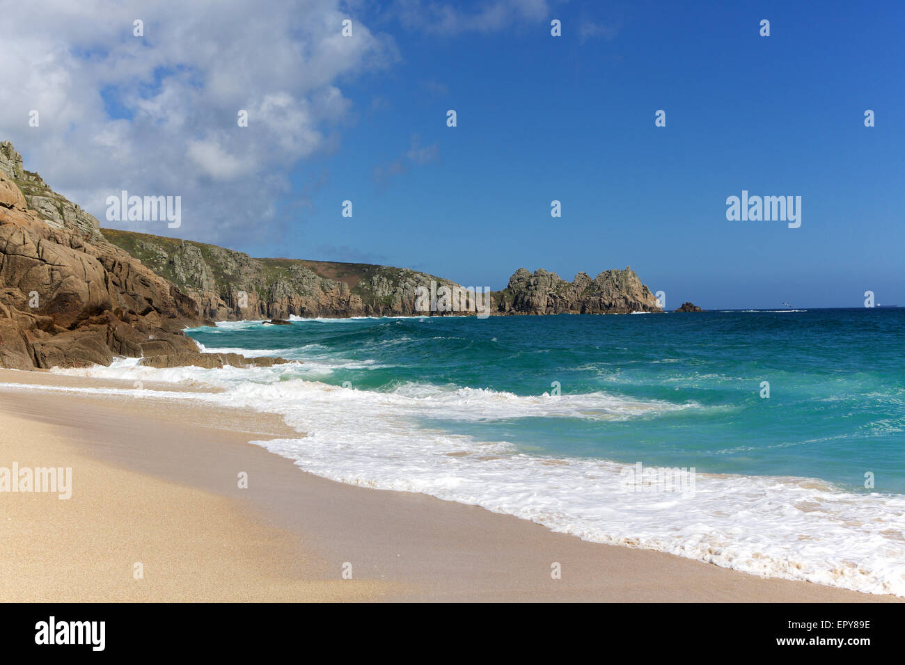 Secluded beach on the South Cornish coast. Idyllic sand surf and blue ...