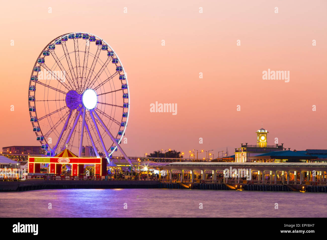 Ferris wheel at sunset Stock Photo - Alamy