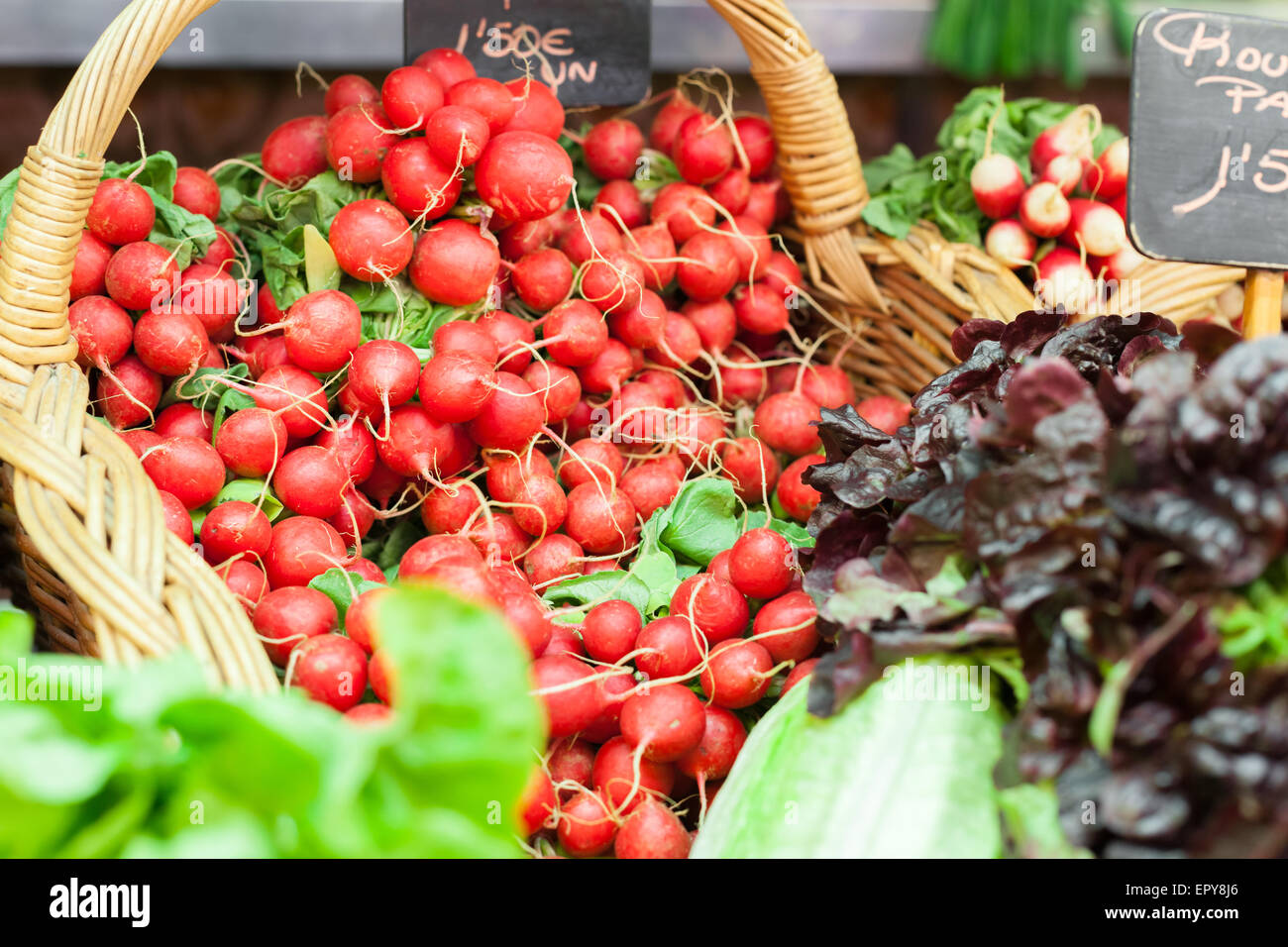 Fresh organic turnips in basket at market stall, La Boqueria Market ...