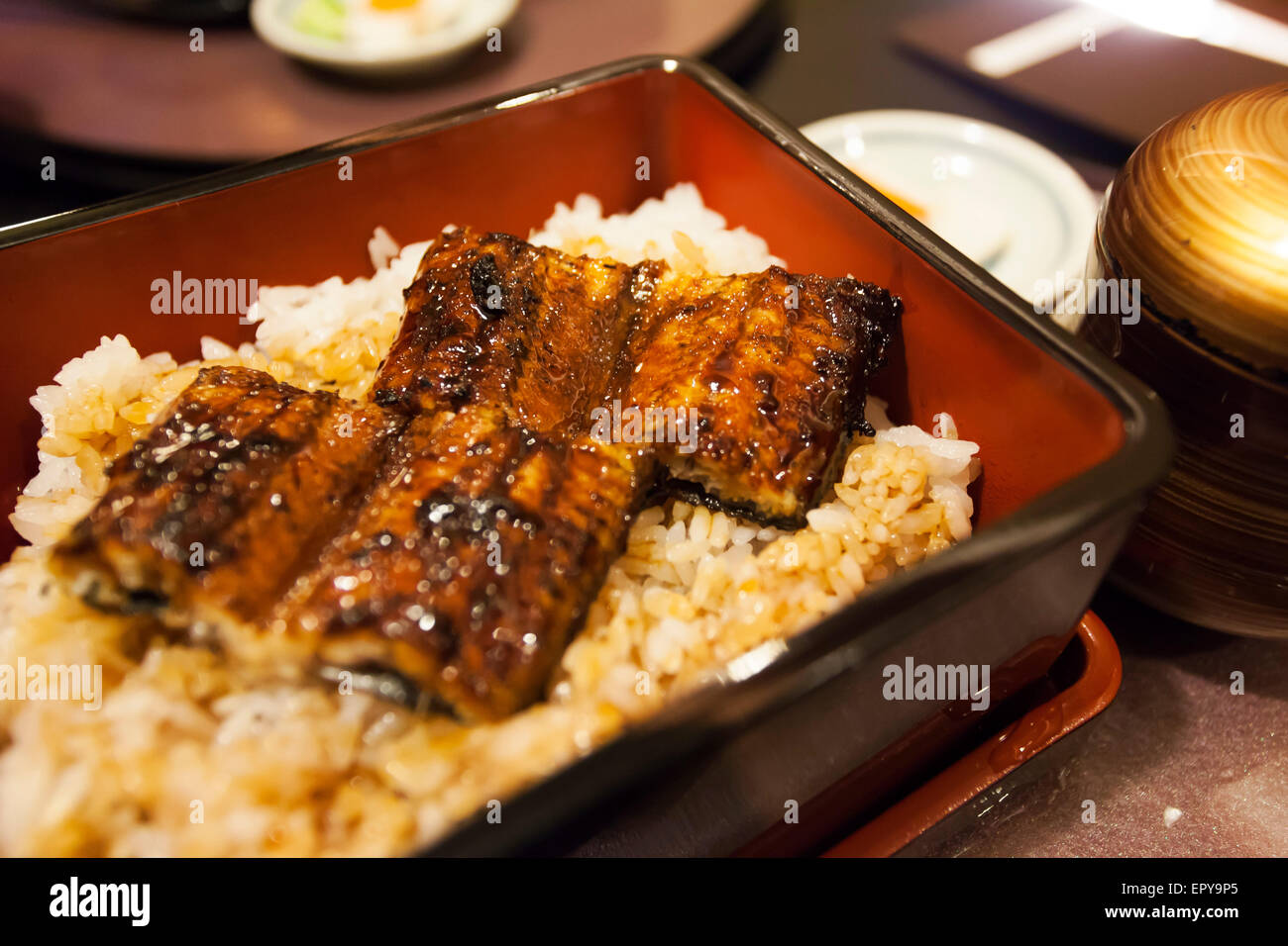 Grilled eel rice in bowl Stock Photo - Alamy