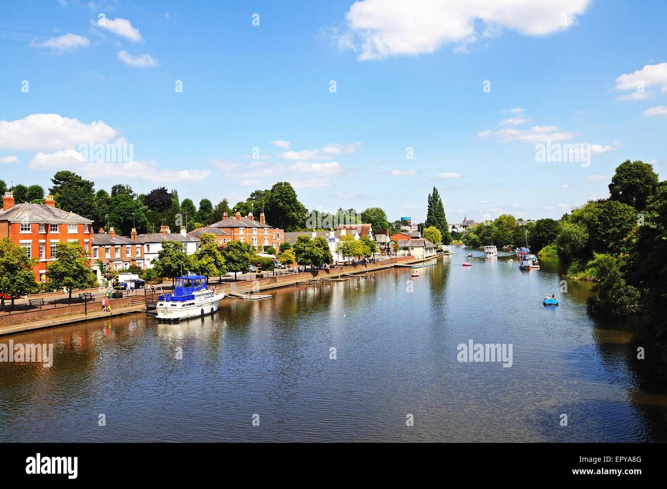 View along the River Dee with riverside buildings to the left hand side ...