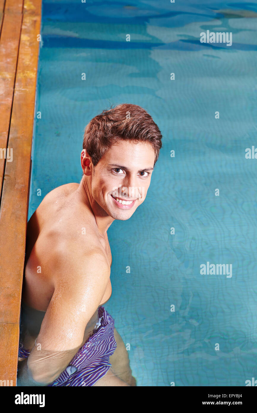 Swimmer standing swimming pool hi-res stock photography and images - Alamy