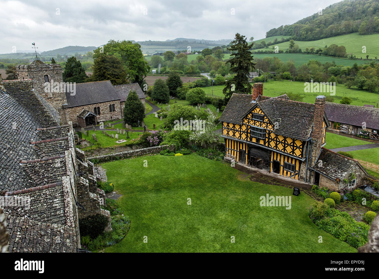 English parish church of St John The Baptist and the gatehouse at ...