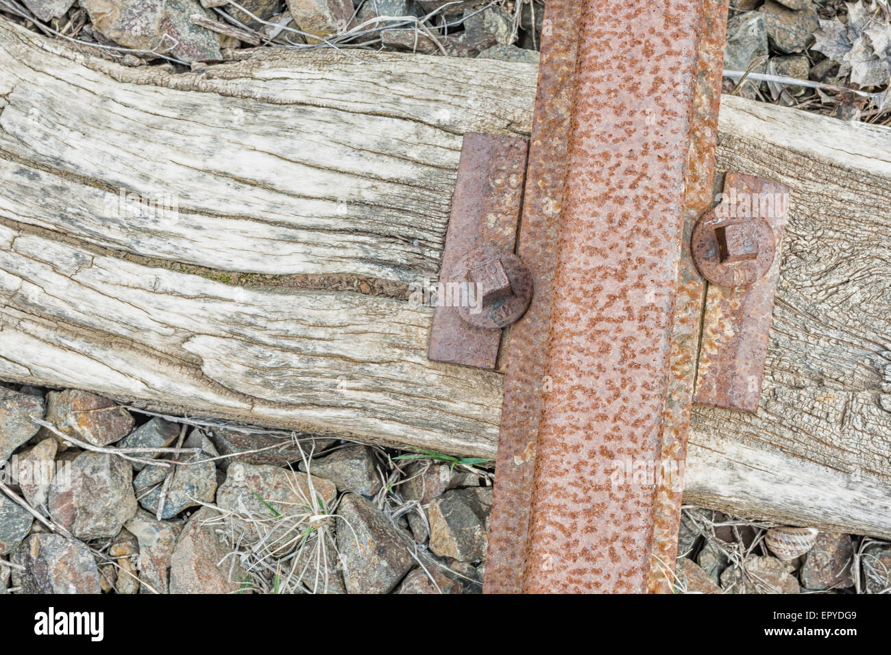 Bolts rusted wood. Particular of a rail tie with track Stock Photo - Alamy