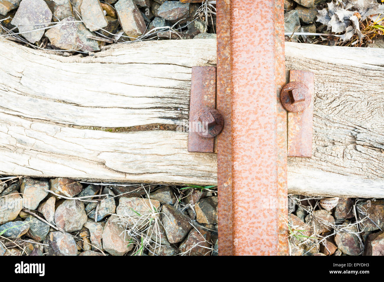 Bolts rusted wood. Particular of a rail tie with track Stock Photo - Alamy