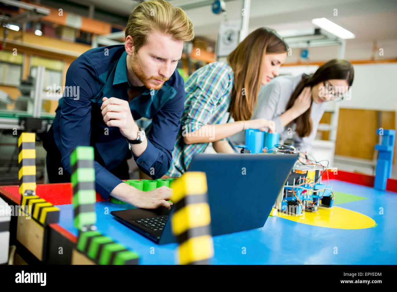 Young people in the robotics classroom Stock Photo - Alamy
