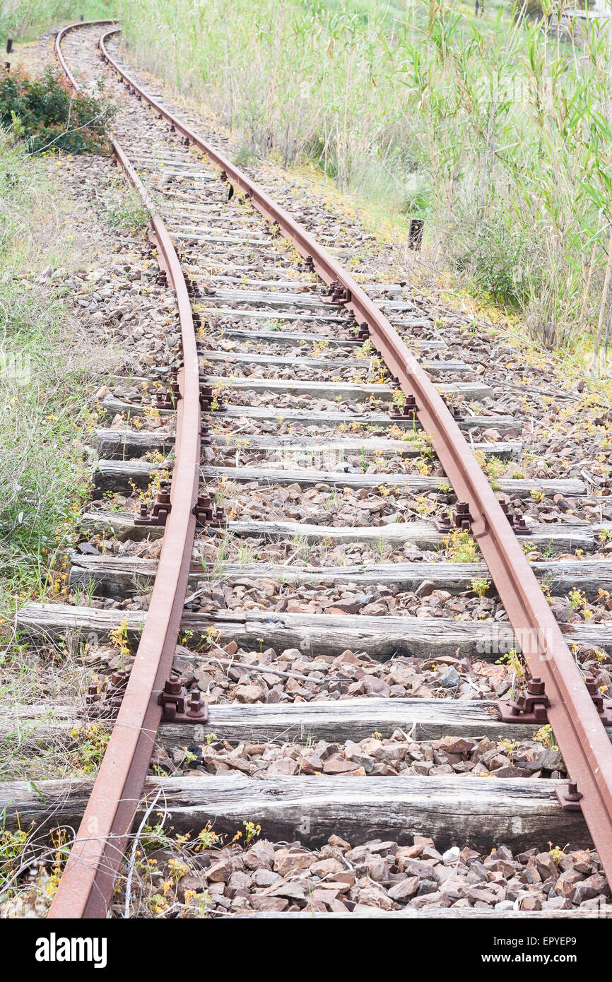 Old abandoned rail tracks, concept of what's around the corner Stock ...