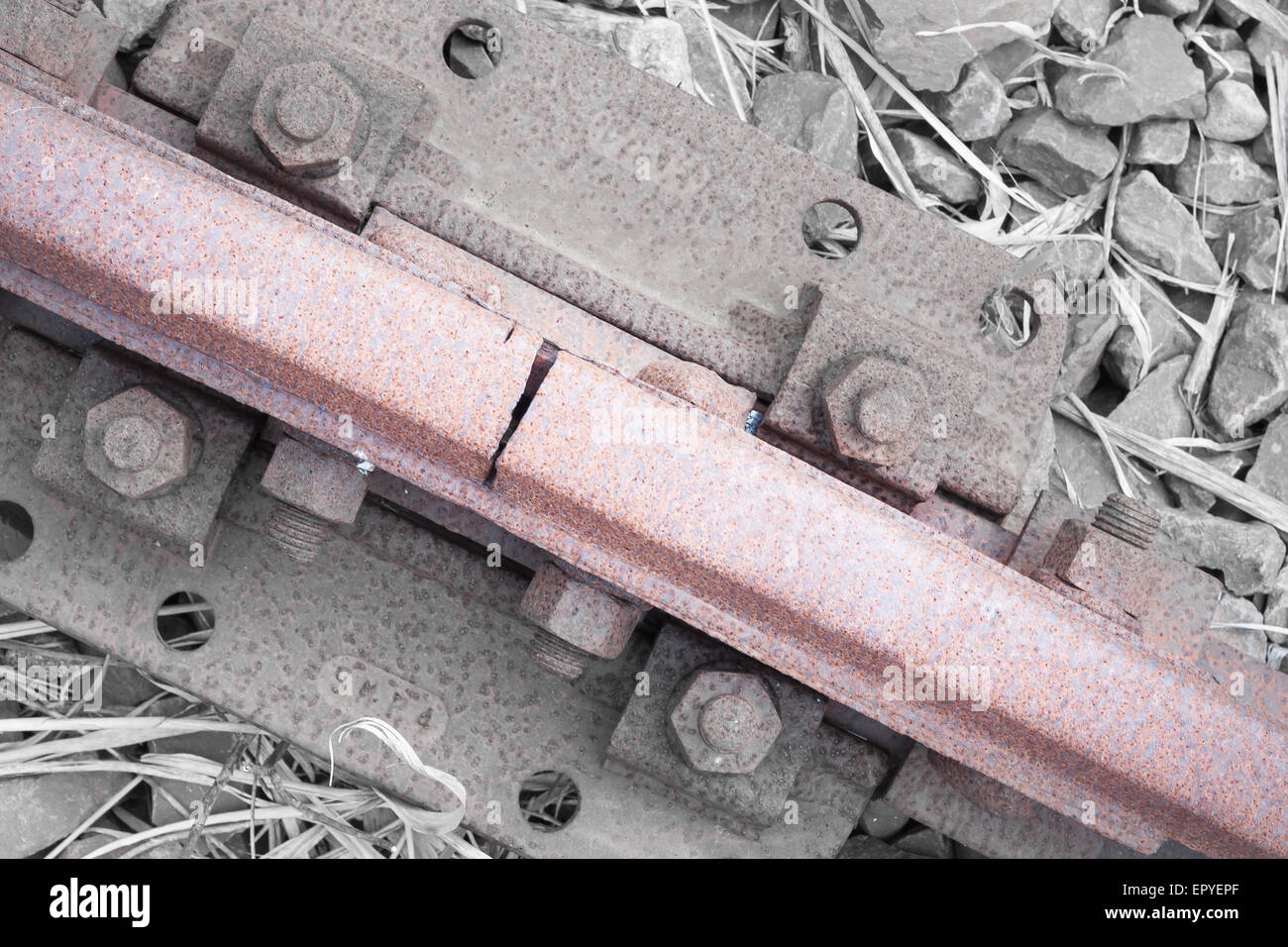 Bolts rusted tracks. Particular of a rail tie with track and rusted ...