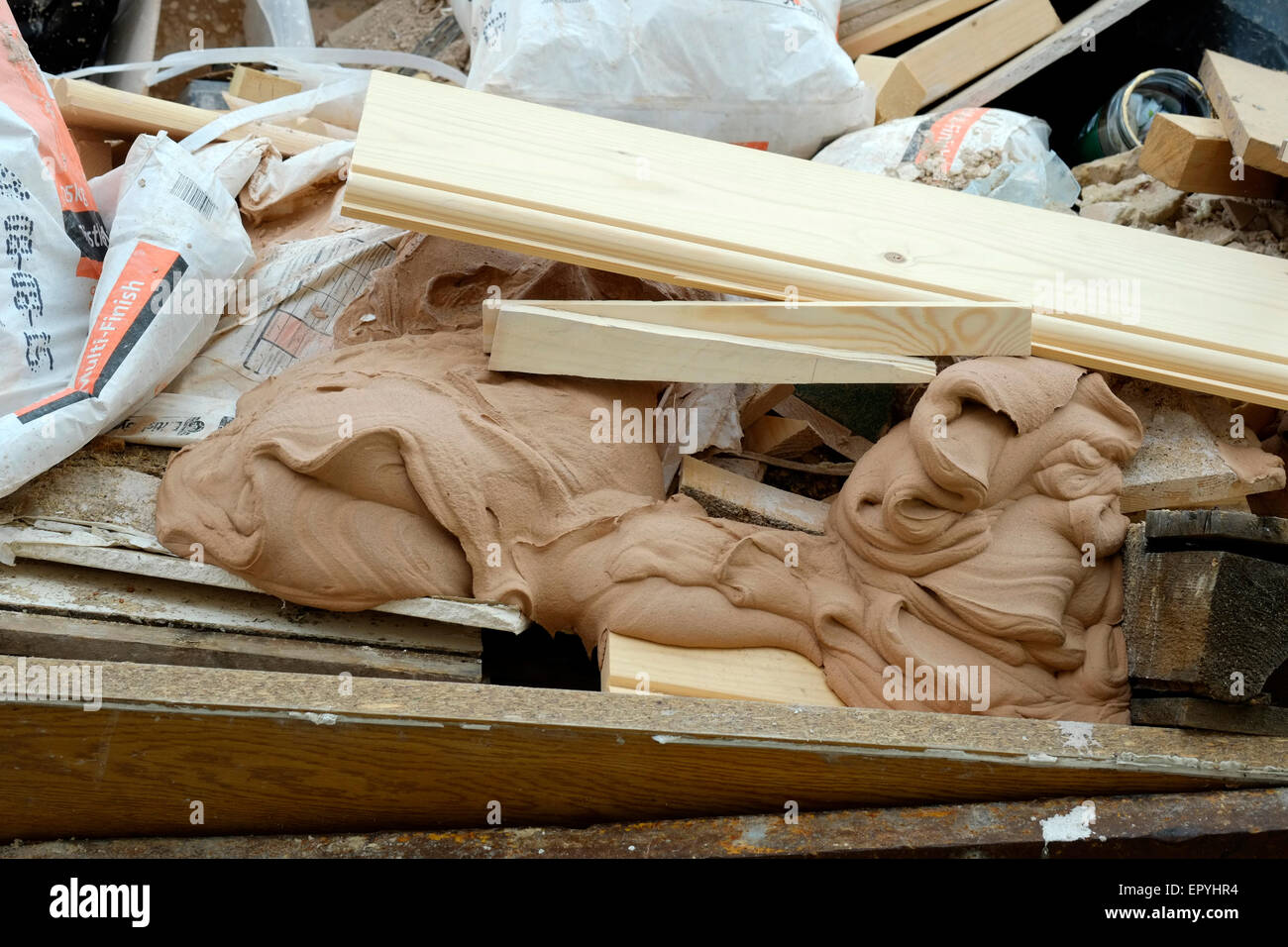 skip full of builders offcuts and general waste Stock Photo - Alamy