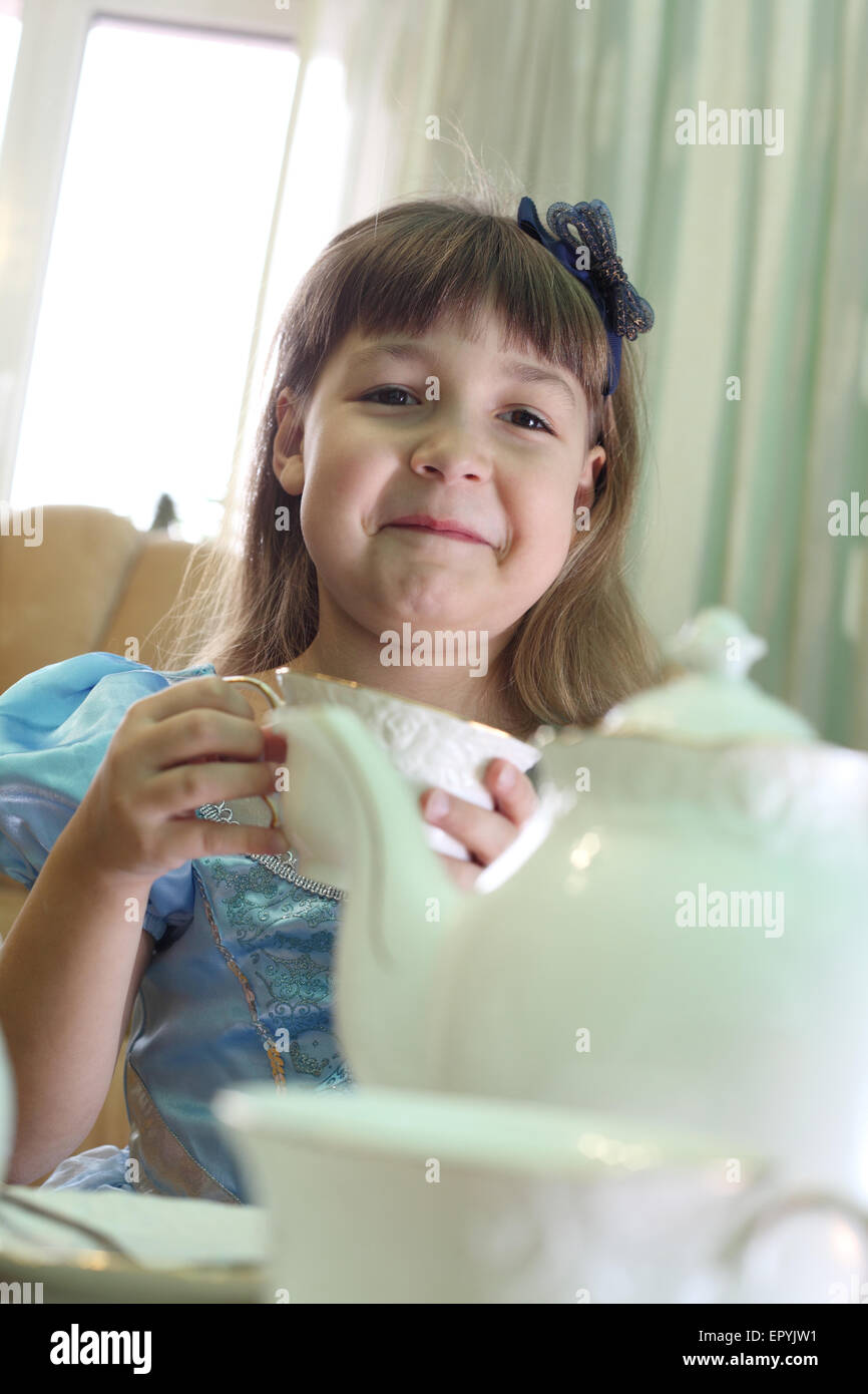 Little Girl Having a Fancy Tea Party Stock Photo - Alamy