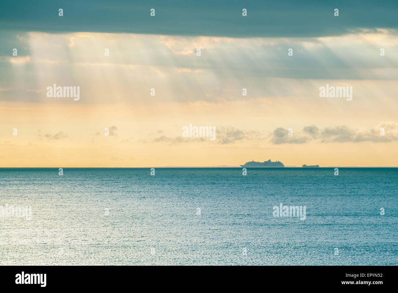 Large ship sailing across the water strip Stock Photo - Alamy