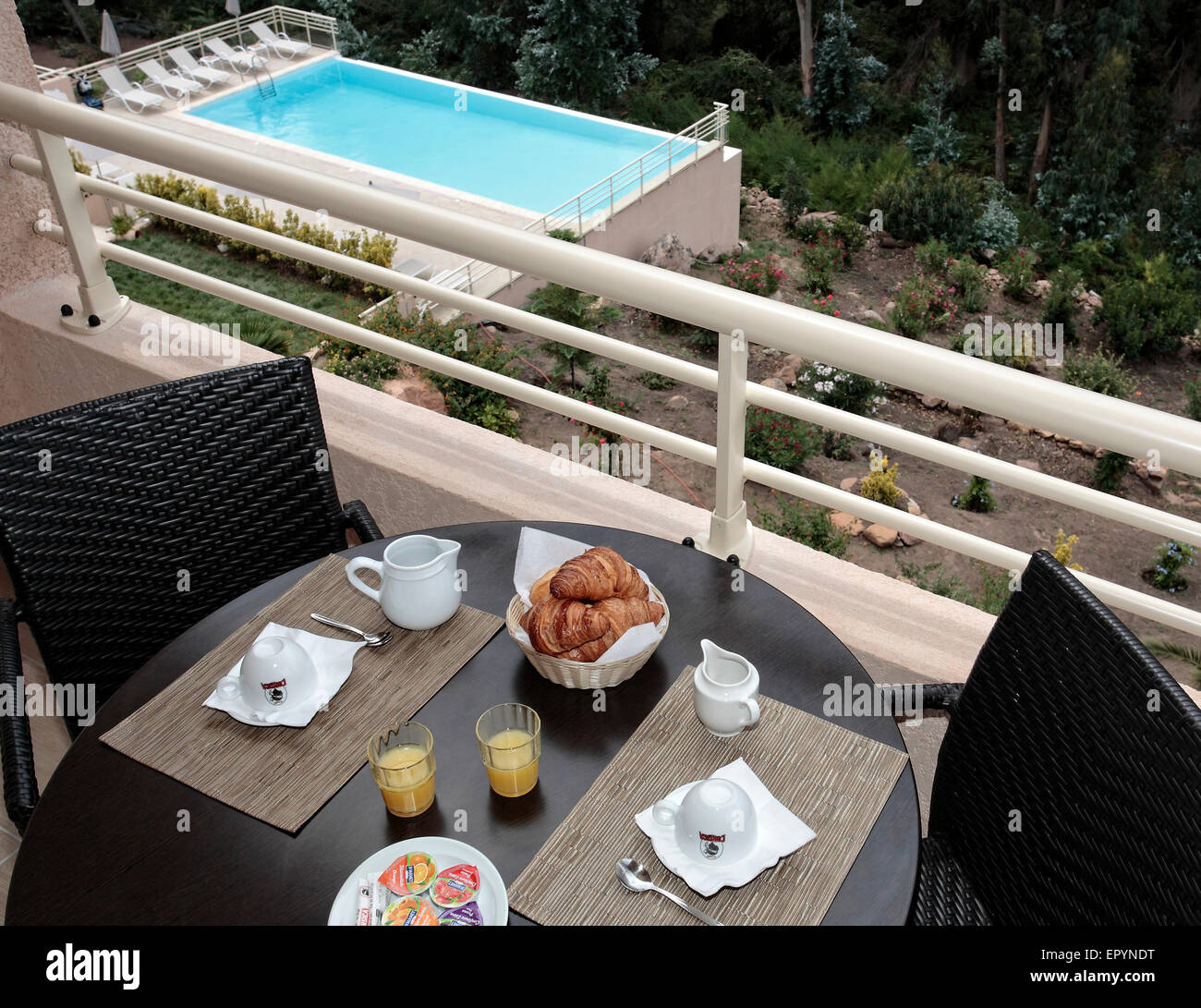 table for two ready for breakfast, near the pool Stock Photo - Alamy
