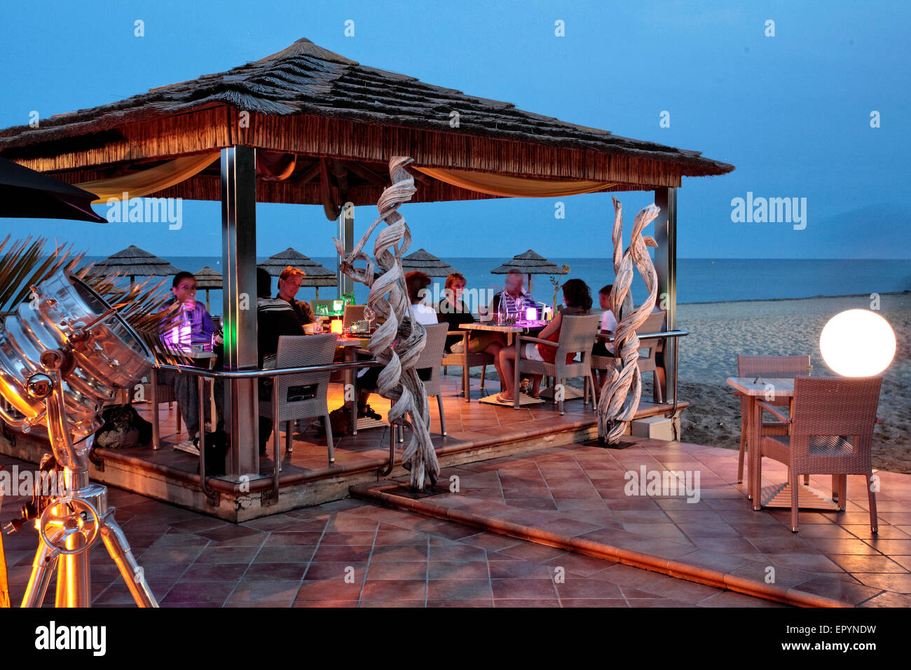 magic dinner on the sea, in summer evening Stock Photo - Alamy