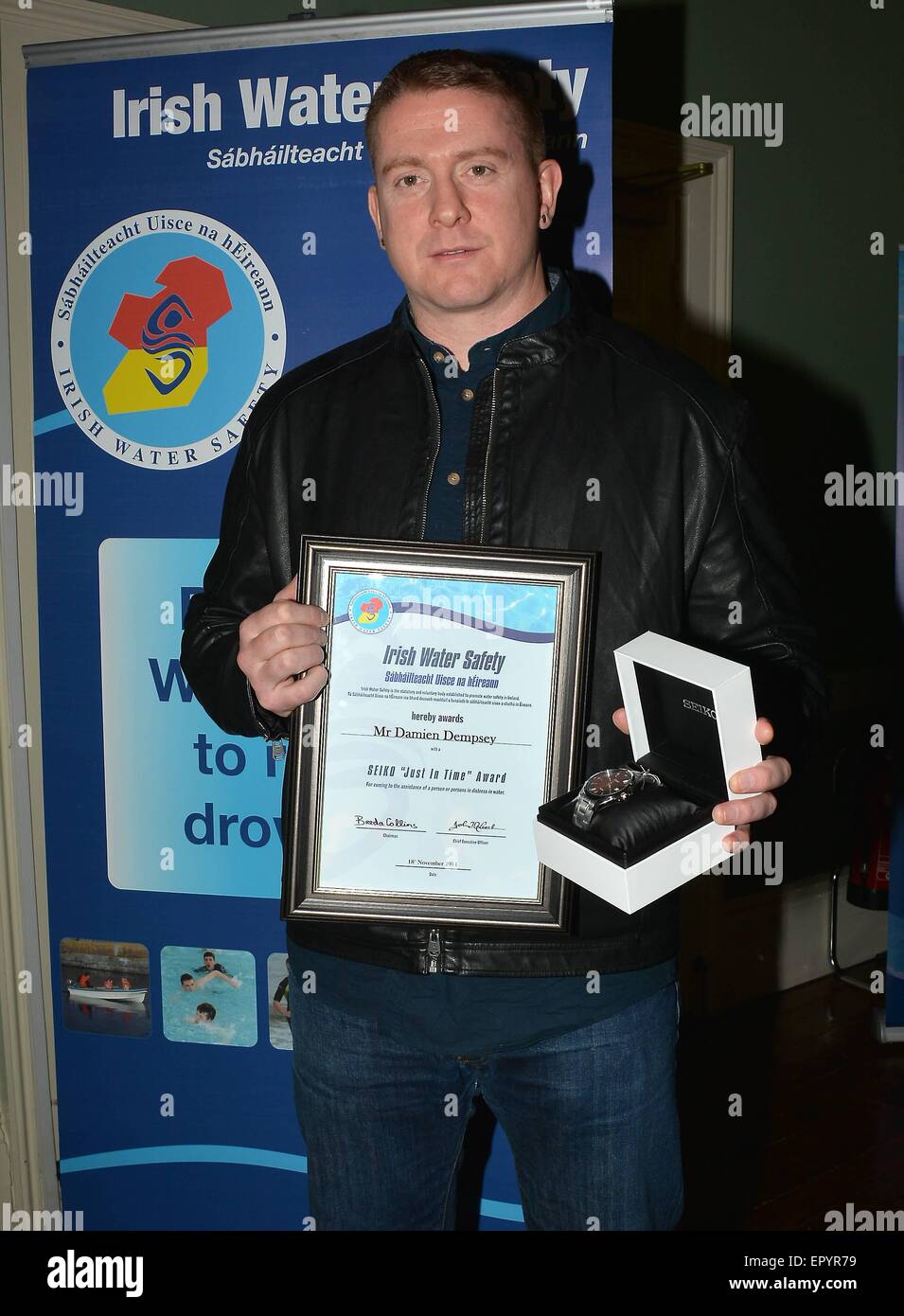 Irish singer Damien Dempsey receives an award from Irish Water Safety ...