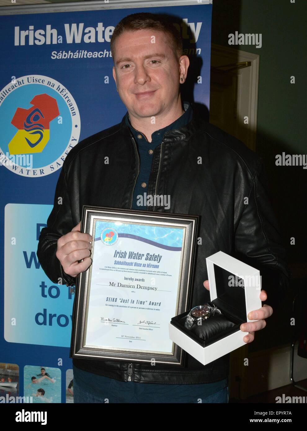 Irish singer Damien Dempsey receives an award from Irish Water Safety ...