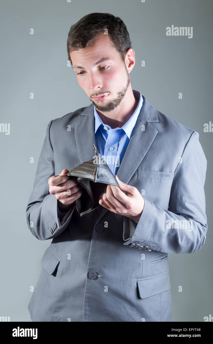 Man holding empty wallet hi-res stock photography and images - Alamy