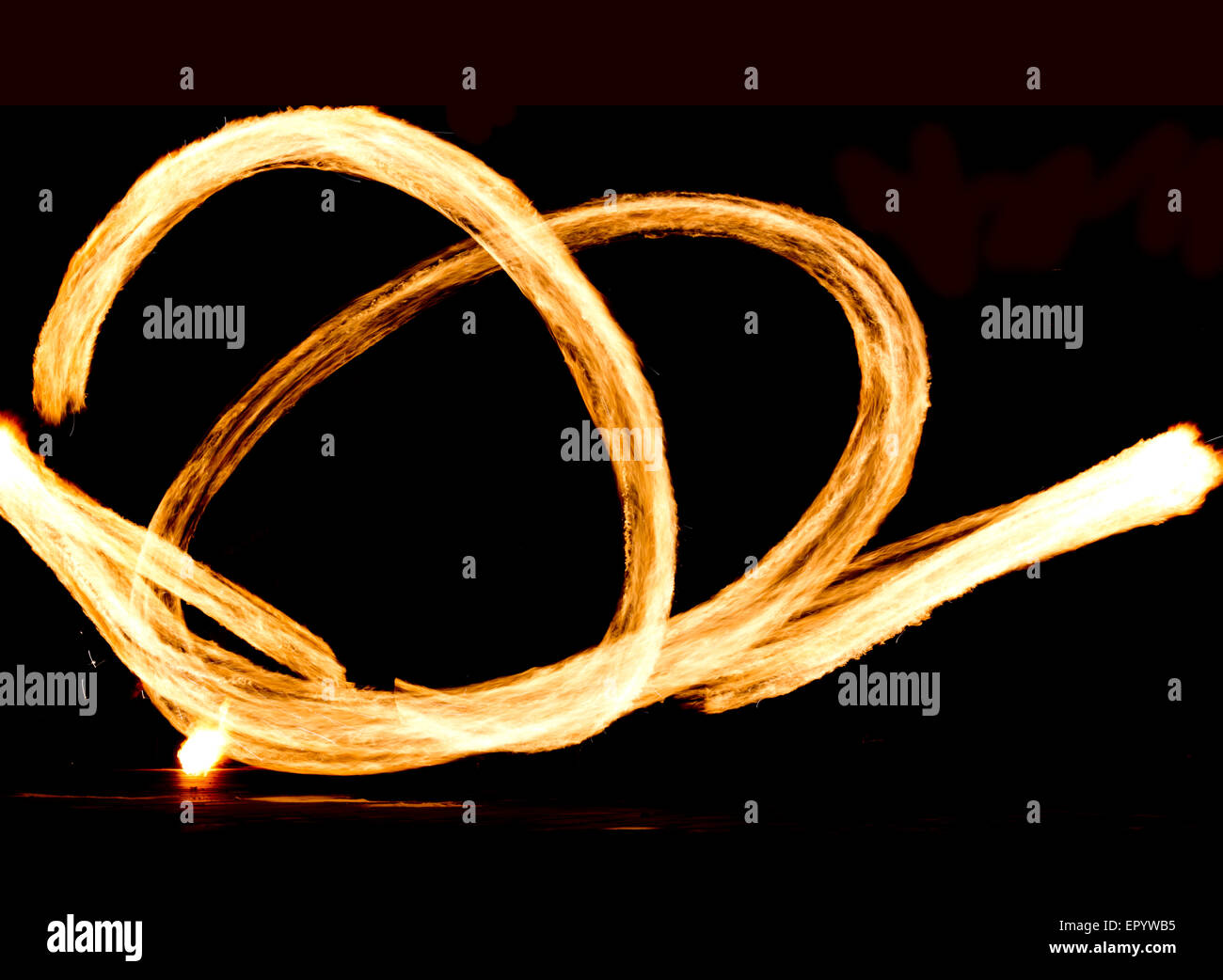 Fire Show Flaming Trails Stock Photo - Alamy