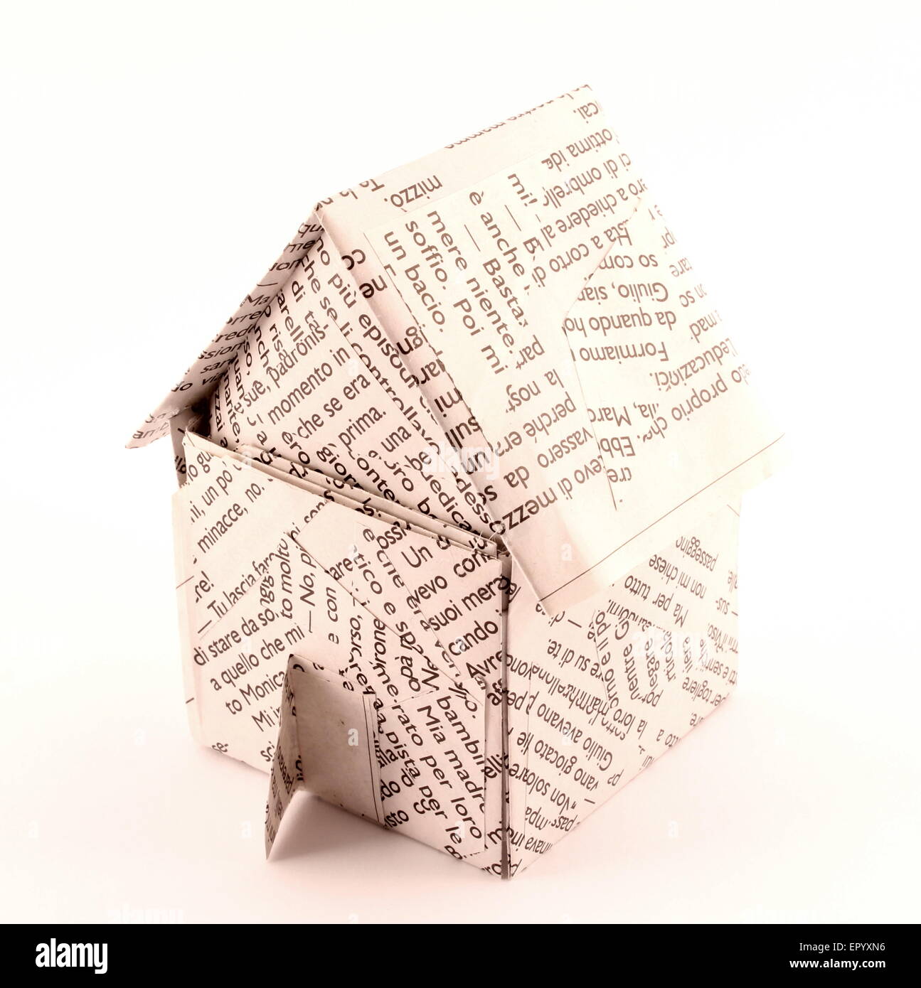 A paper house, built with a sheet of paper, printing Italy Stock Photo ...