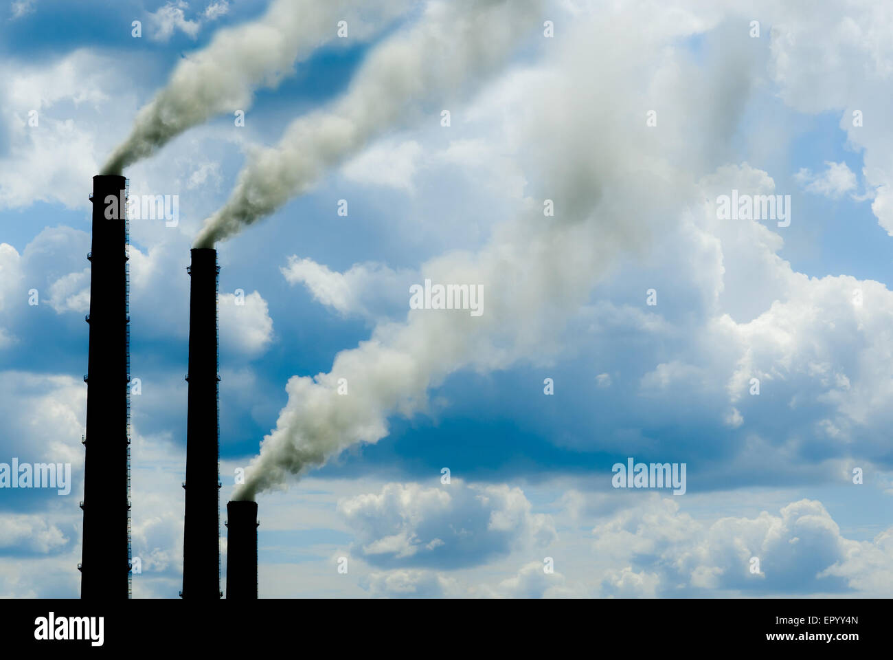 Drama in heavens - scary image of power plant emissions Stock Photo - Alamy