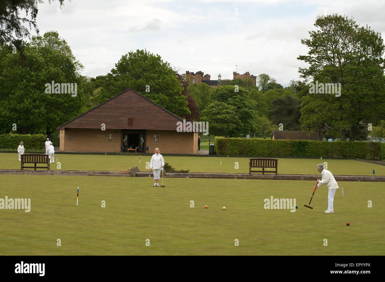 Woman playing croquet hi-res stock photography and images - Alamy