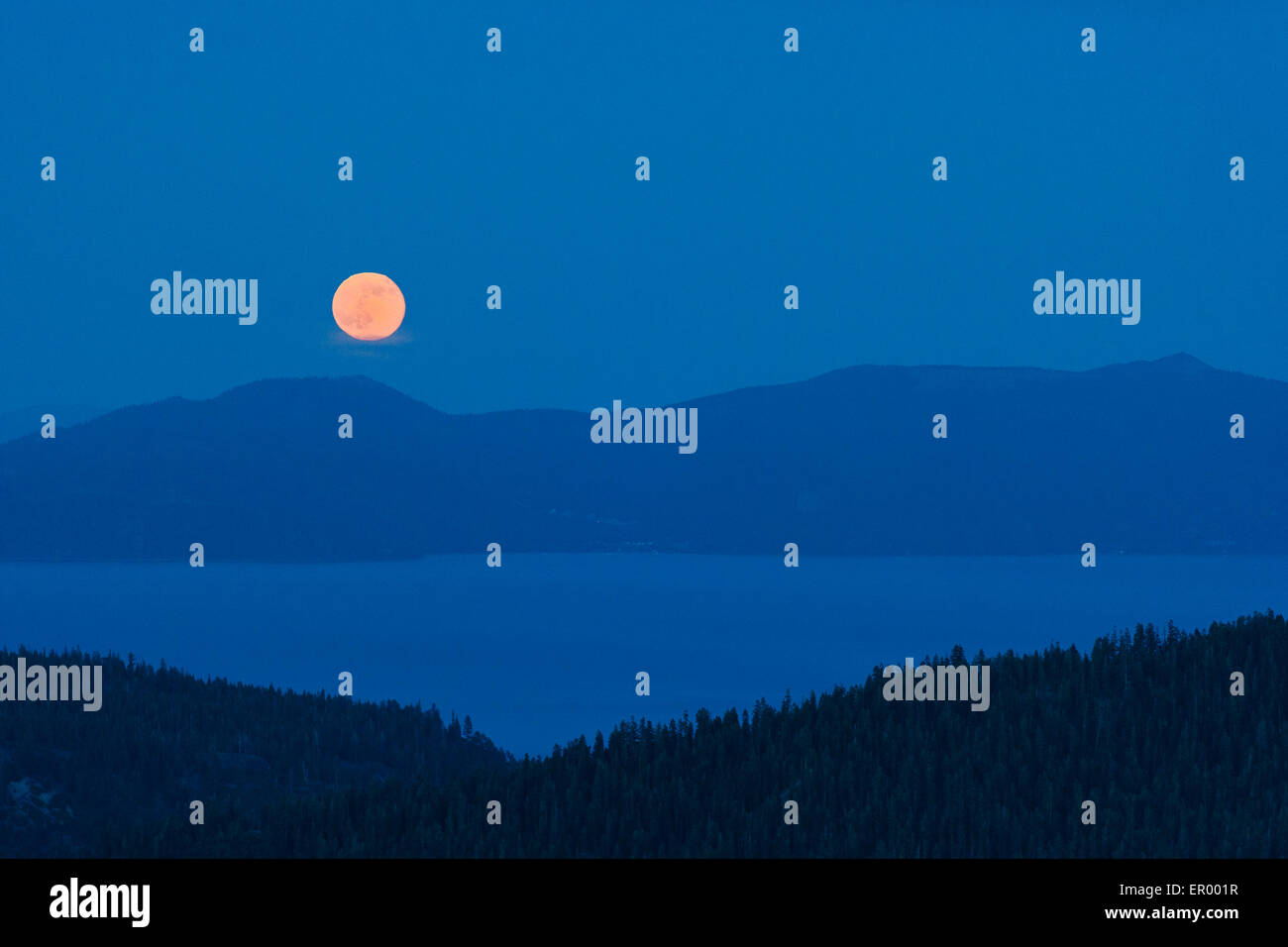 Full moon rising over lake Tahoe as seen from Squaw Valley high camp ...