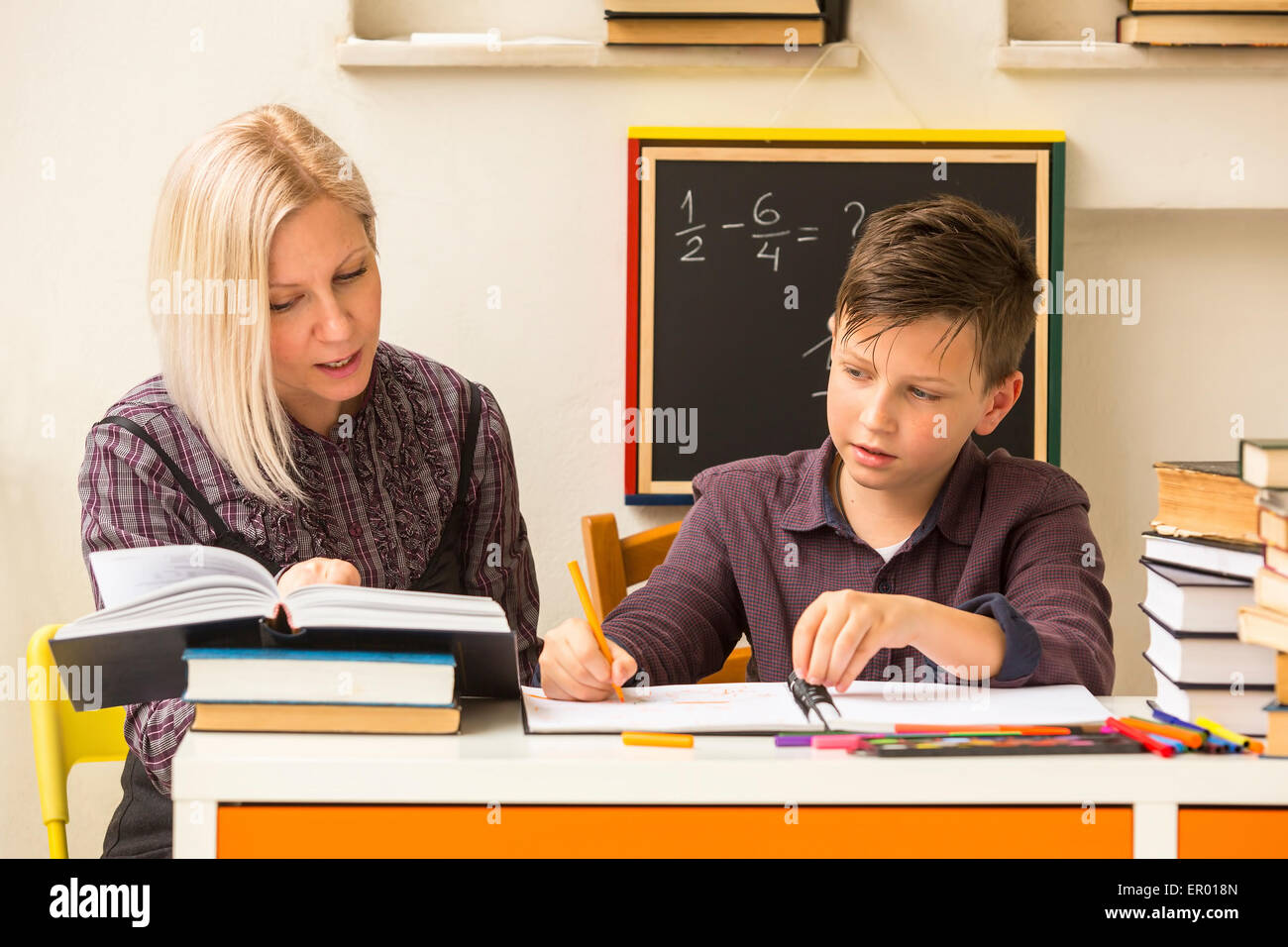 Tutoring at home hi-res stock photography and images - Alamy