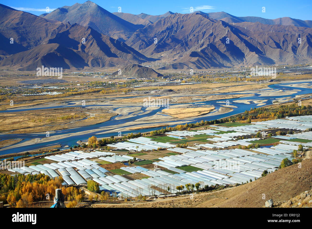 Hothouses on the Kyichu-Lhasa river banks seen from the Nachan La ...