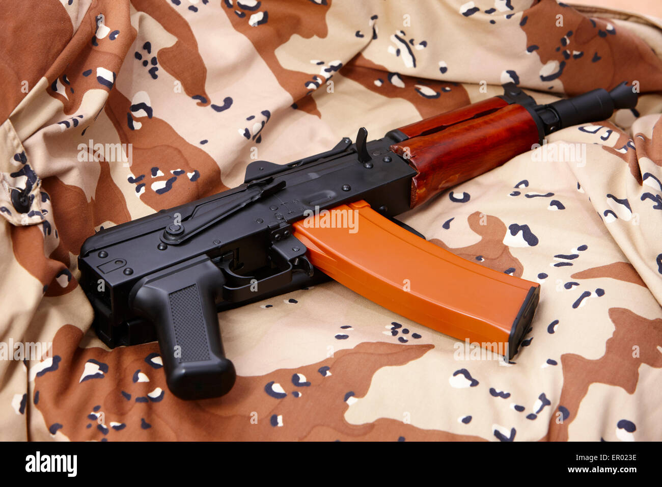 aks-47u on old persian gulf war desert battle dress uniform Stock Photo ...