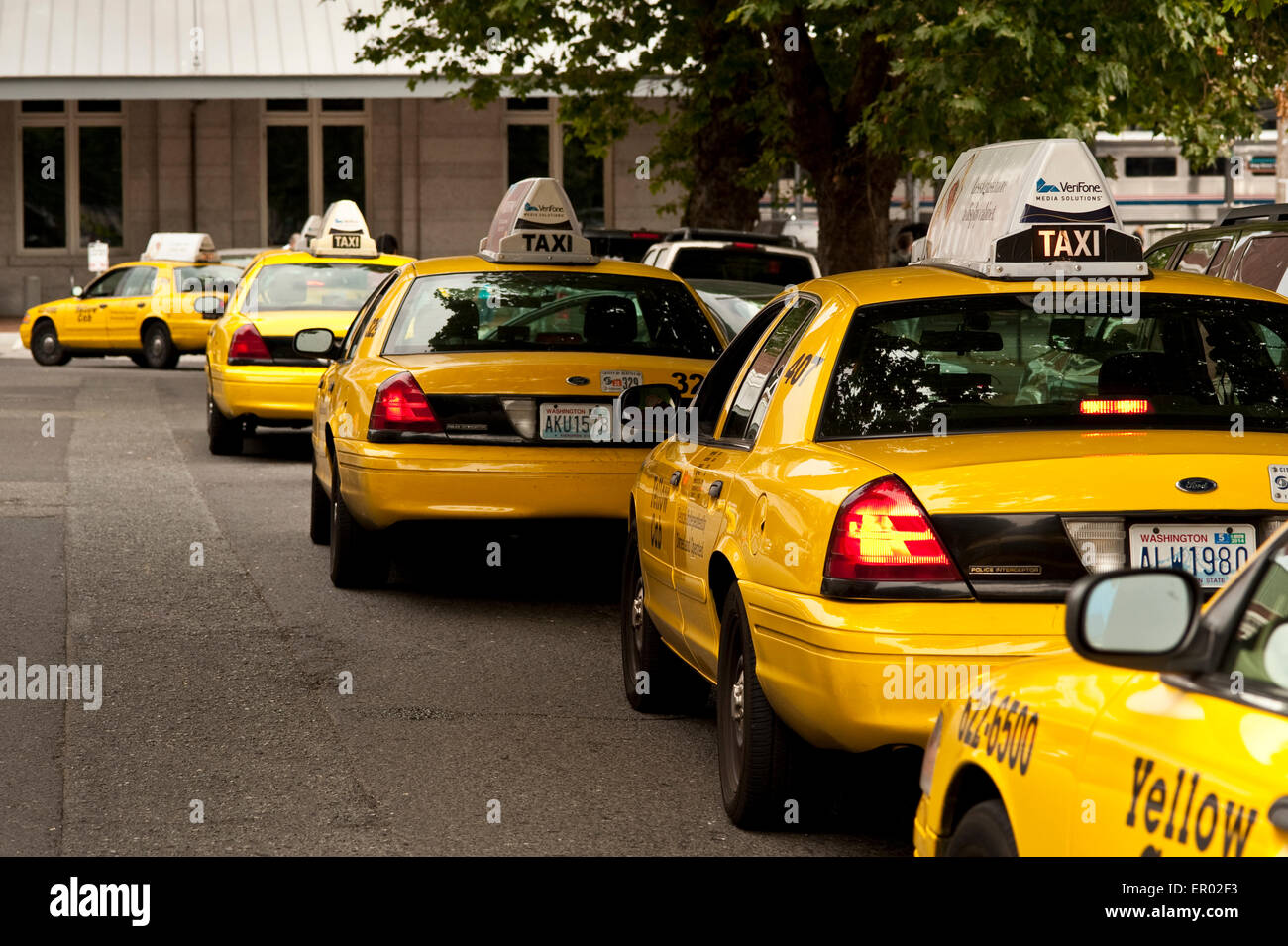 Taxi's lining up to pick up passengers at the King Street Railroad ...