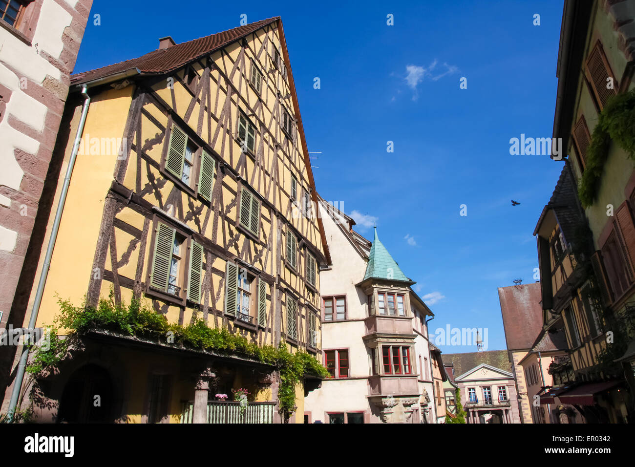 Half-timbered houses in Riquewihr, one of the most beautiful villages ...