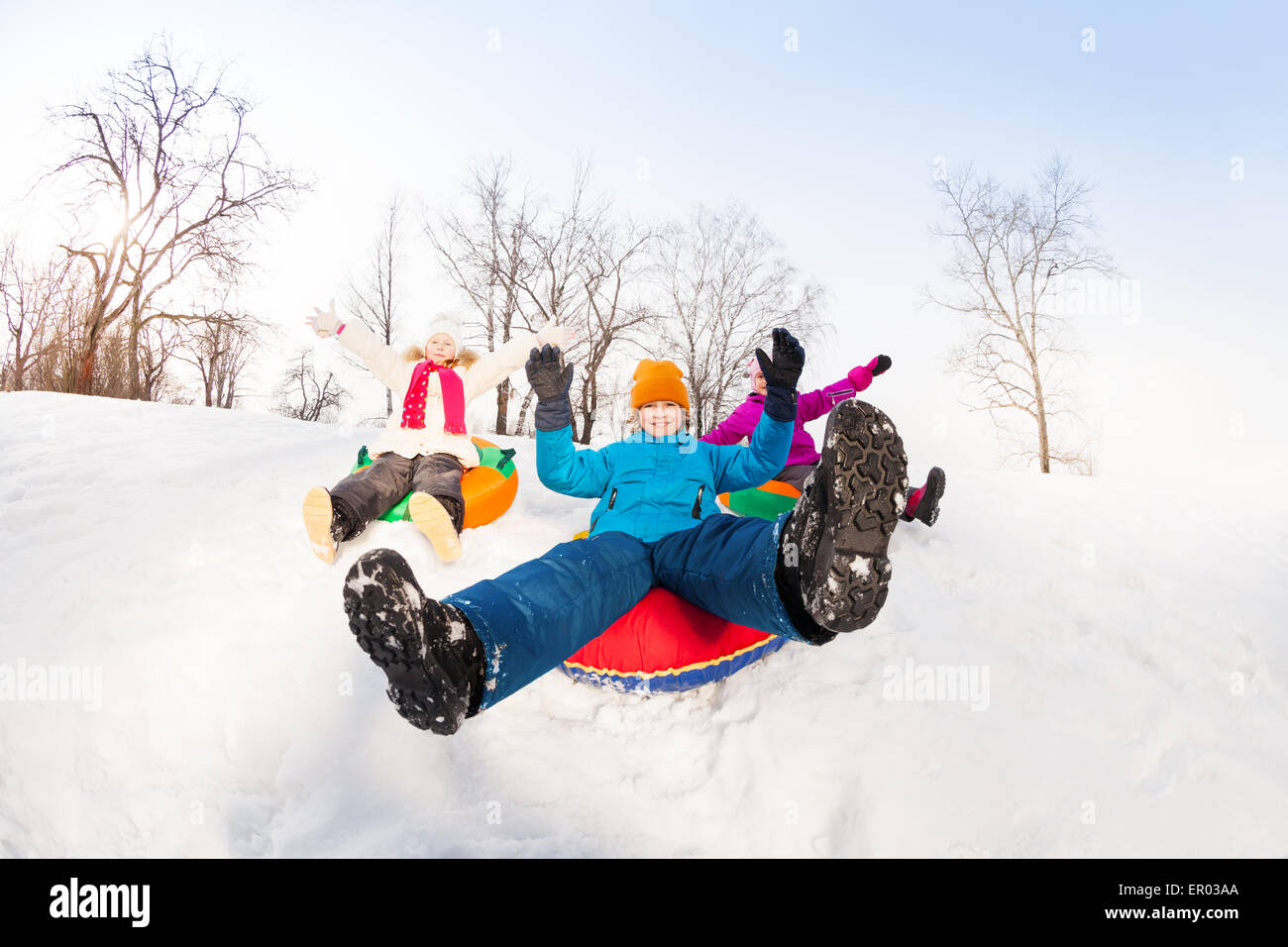 Boy girl kids sliding hi-res stock photography and images - Alamy