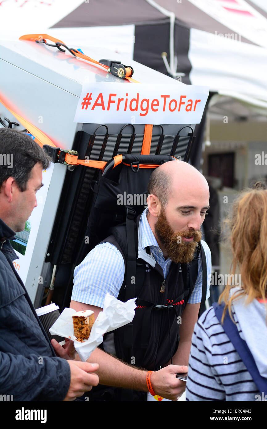 man with fridge on his back fund raising at county show Stock Photo - Alamy