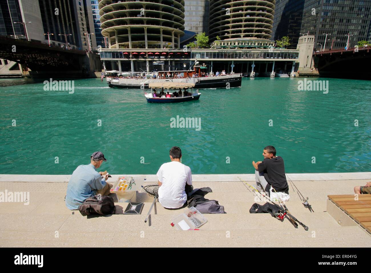 Chicago, USA 23rd May, 2015. Three friends fish from the south bank of ...