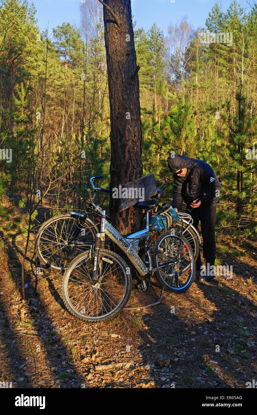Travel on the spring road on the bike Stock Photo - Alamy