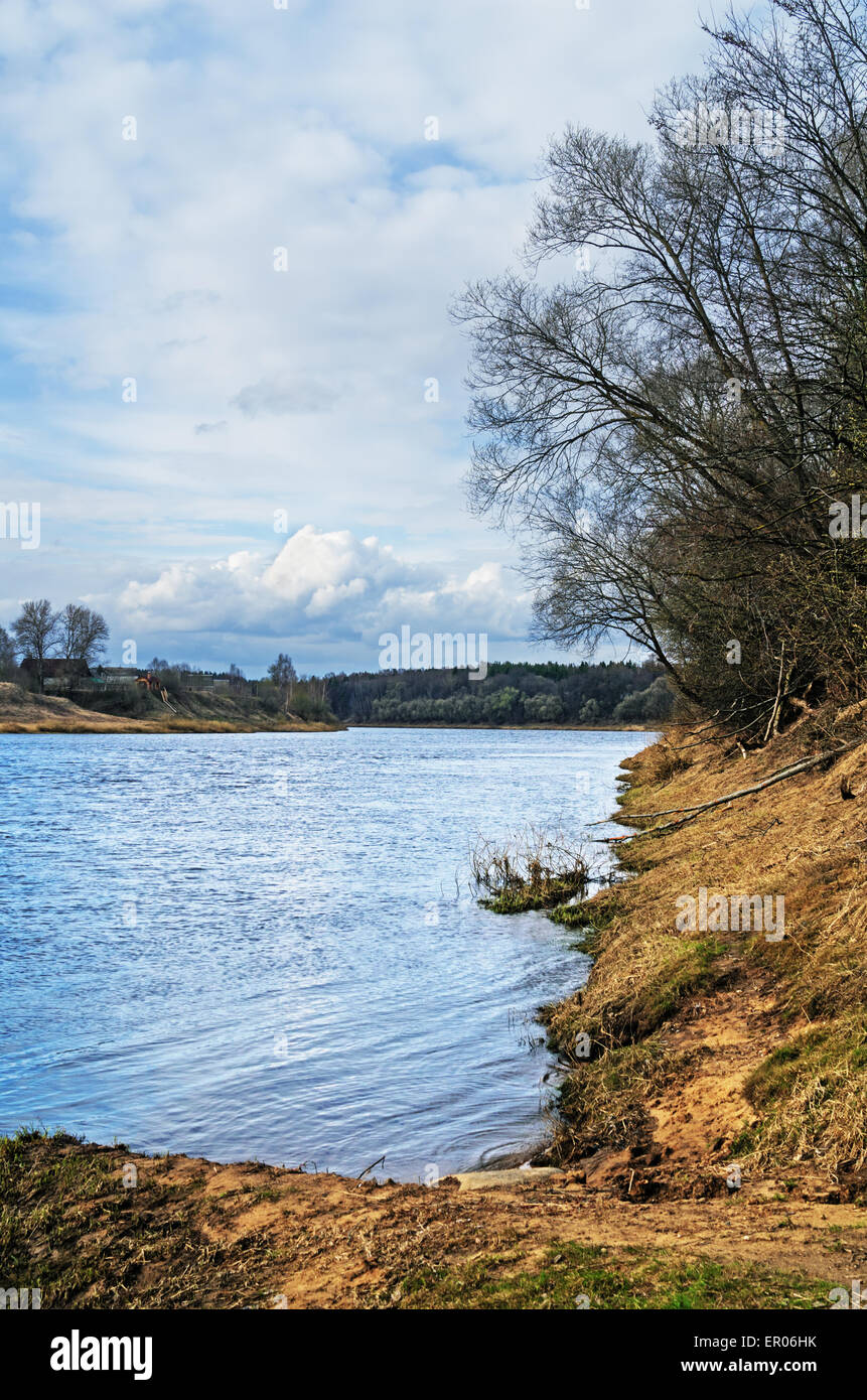 Spring river landscape with dry grass Stock Photo - Alamy