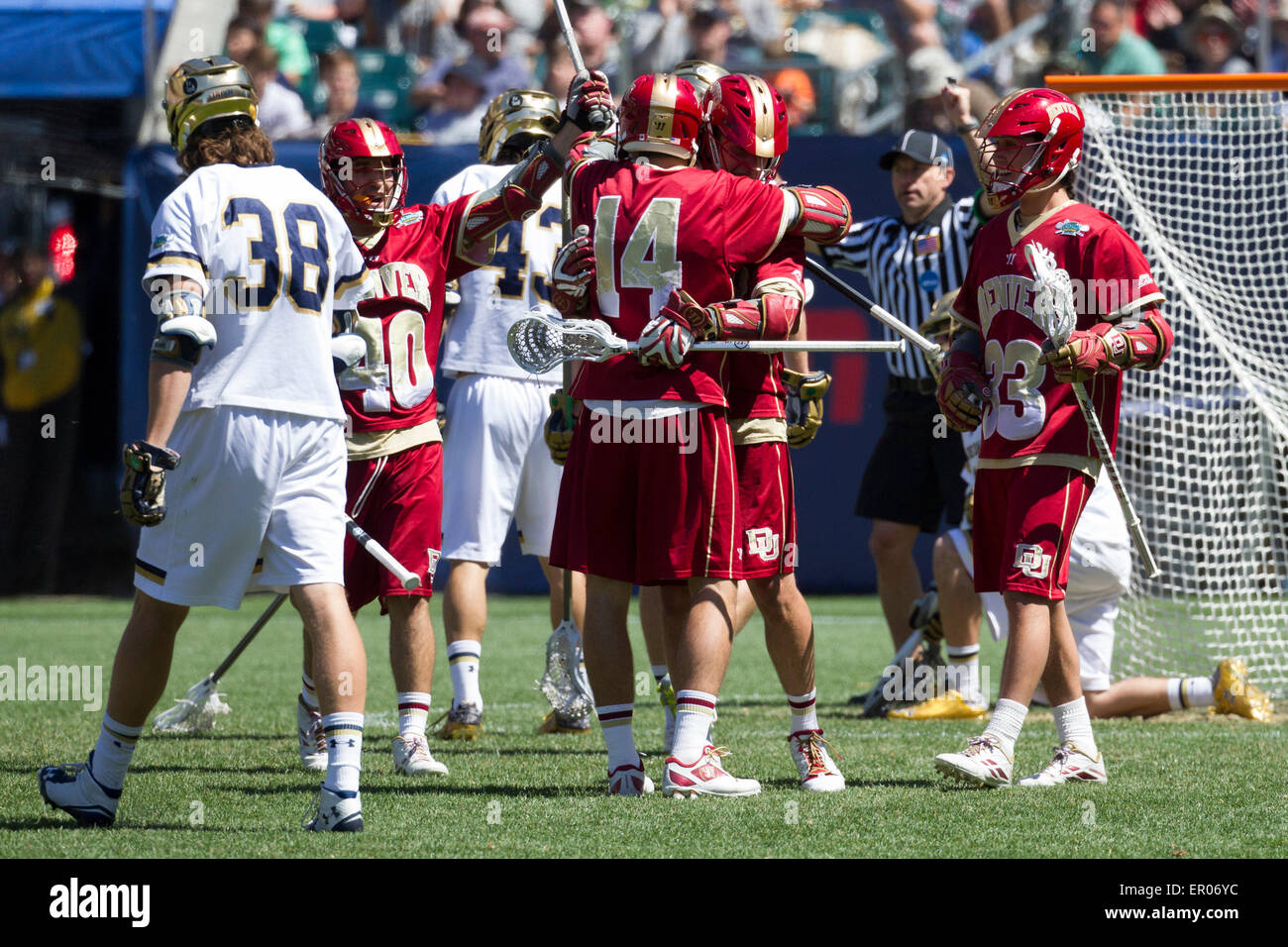 Overtime. 23rd May, 2015. Denver Pioneers midfield Tyler Pace (3) hugs ...