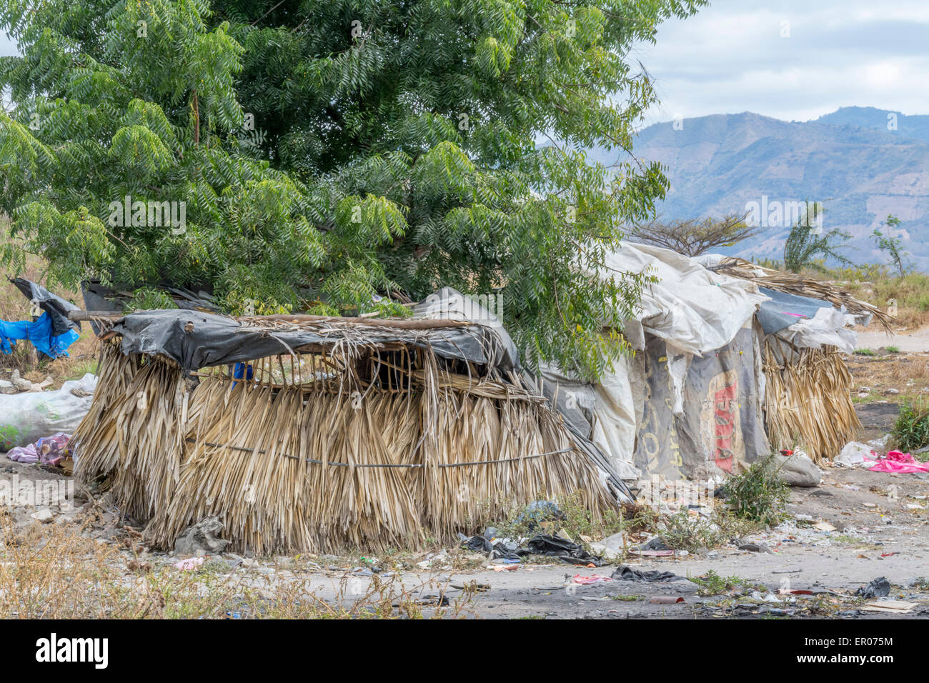 Storage huts for recyclable items collected by poor people at a garbage ...
